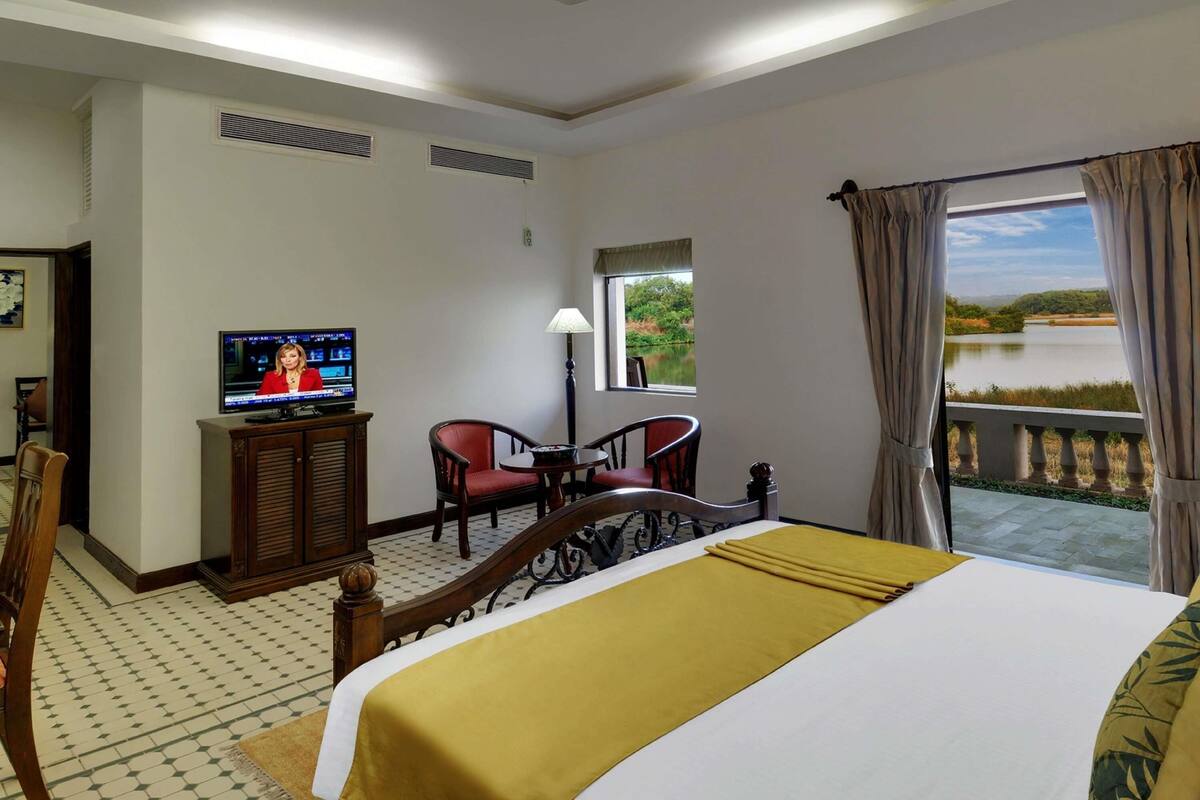Suíte luxo, 1 cama de casal, vista para o rio (Cozy Sitout, Private Veranda) | Roupas de cama de algodão egípcio, roupas de cama premium