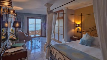 Suite Júnior, vista para o mar | Minibar, cofre no quarto, secretária, ferro/tábua de engomar