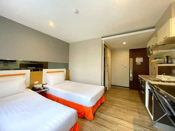 Deluxe Room Twin Beds | Individualmente mobiliados, ferros/tábuas de passar roupa