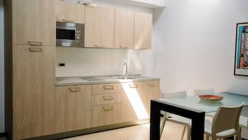 Apartamento, 1 quarto (4 people) | Sala de estar | Televisor LCD