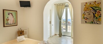 Quarto Deluxe, 1 cama de casal ou 2 camas individuais, terraço, vista para o mar | Camas de colchão Select Comfort, minibar, cofre no quarto 