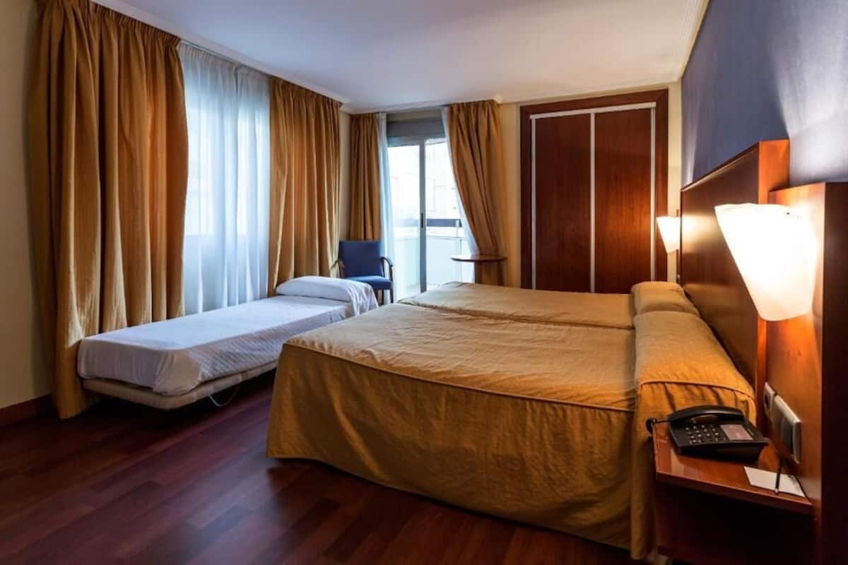Cofre no quarto, secretária, camas desdobráveis, Wi-fi grátis