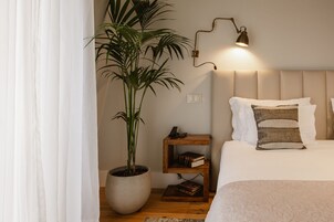Suíte com design assinado | Frigobar, cofres nos quartos, quartos à prova de som