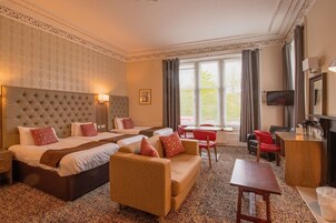 Estúdio urbano (Triple Occupancy) | Cofres nos quartos, escrivaninha, espaço de trabalho para notebook