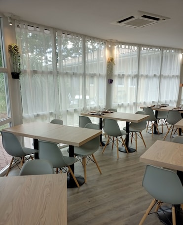 Restaurante. Hôtel Montaigne Montcaret