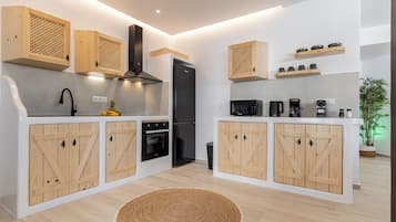 Suite Bon Vivant | Cozinha privada | Geladeira, cooktop, cafeteira/chaleira