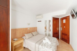 Frigobar, Wi-Fi de cortesia, roupa de cama