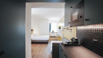 Appartamento con 2 camere da letto | Cozinha privada | Uma cadeira de bebé