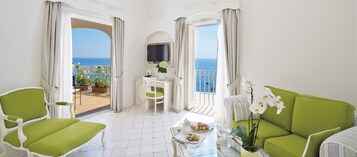 Suíte júnior | Área de estar | TV