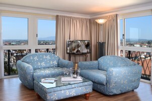 Suíte júnior | Área de estar | TV LCD