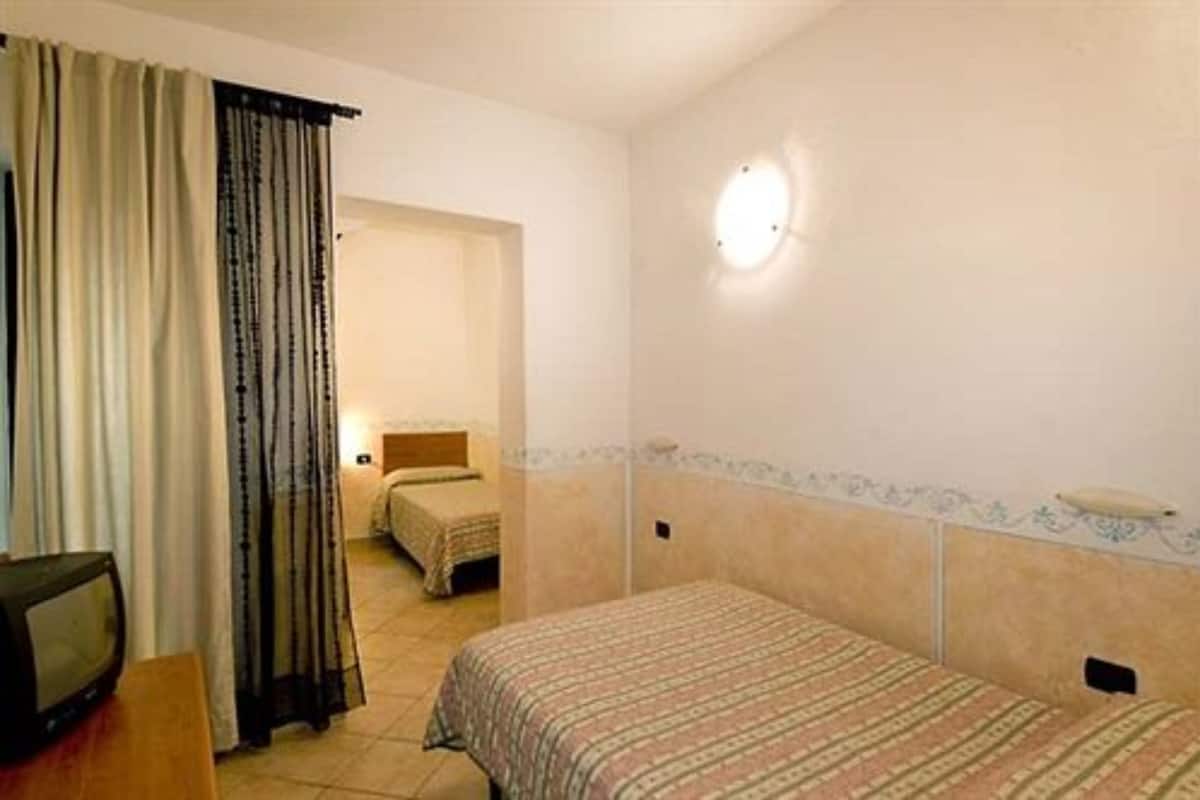 Quarto Quádruplo | Cofre no quarto, secretária, quartos insonorizados, Wi-fi grátis