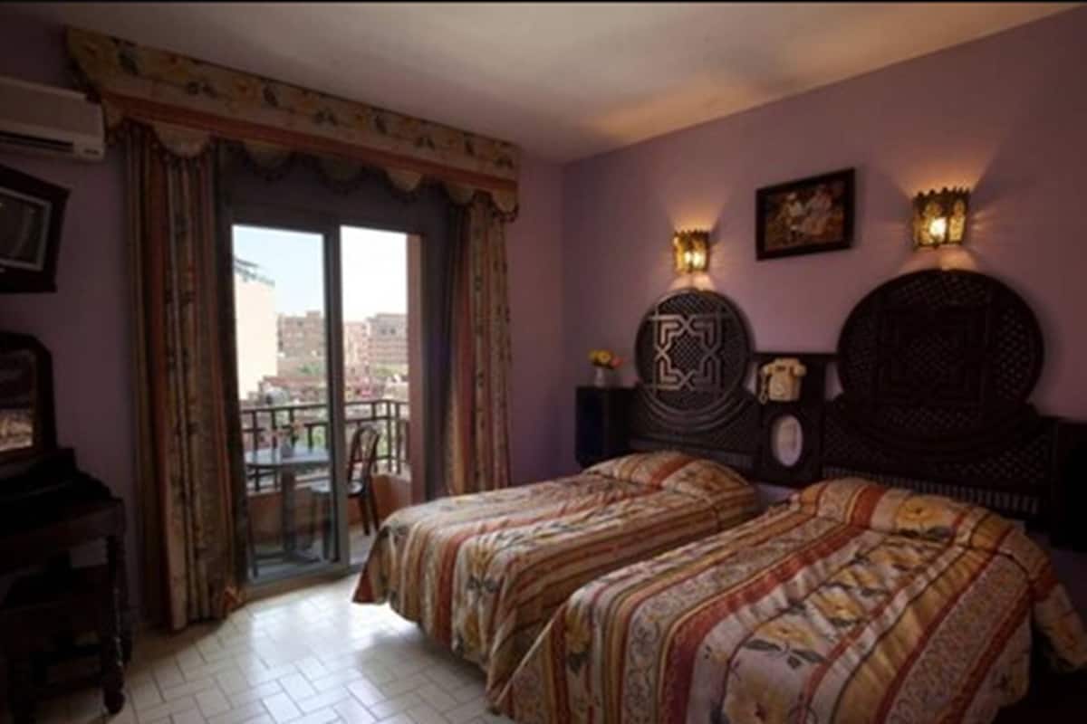 Quarto Familiar | Minibar, secretária, camas desdobráveis, Wi-fi grátis