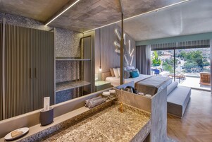 Suite-Estúdio Deluxe, 1 cama king-size, banheira de hidromassagem | Lavatório na casa de banho