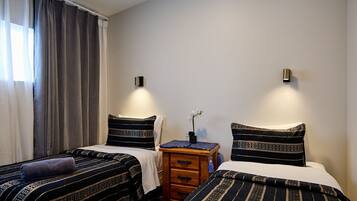 Apartamento família | Ferros/tábuas de passar roupa, Wi-Fi de cortesia, roupa de cama