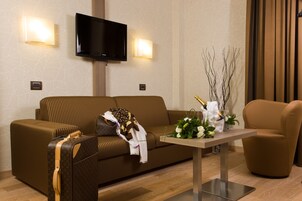 Roupa de alta qualidade, edredões de penas, minibar 