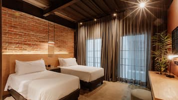 Roupas de cama premium, edredons de pluma, frigobar, cofres nos quartos