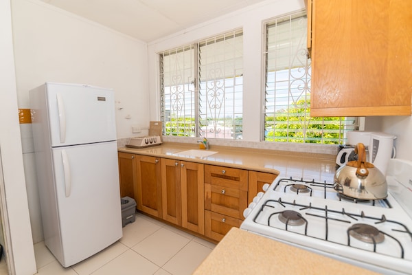 Quarto standard, 2 quartos | Cozinha privada | Cafeteira/chaleira, geladeira, micro-ondas, cooktop
