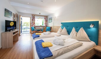 Apartamento clássico, 2 quartos (2-4) | Roupas de cama premium, camas Select Comfort, cofres nos quartos
