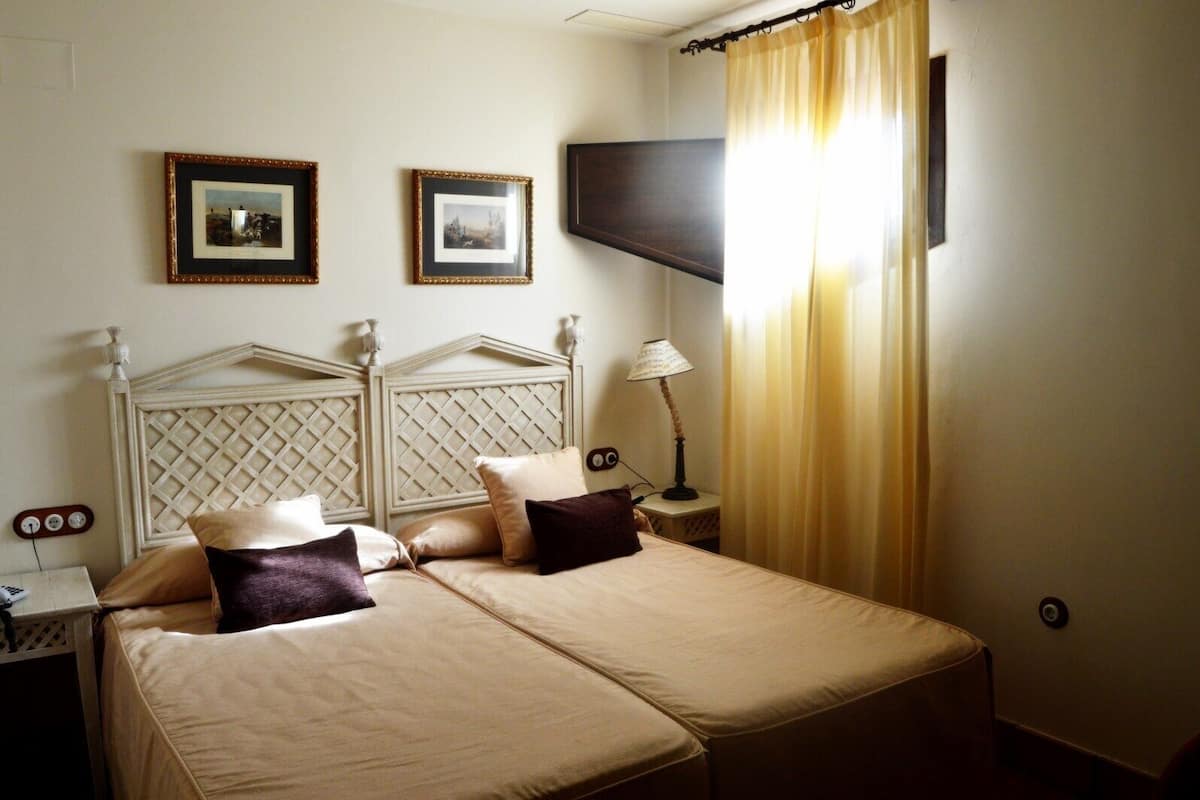Quarto casal de uso individual | Frigobar, cofres nos quartos, cortinas blackout