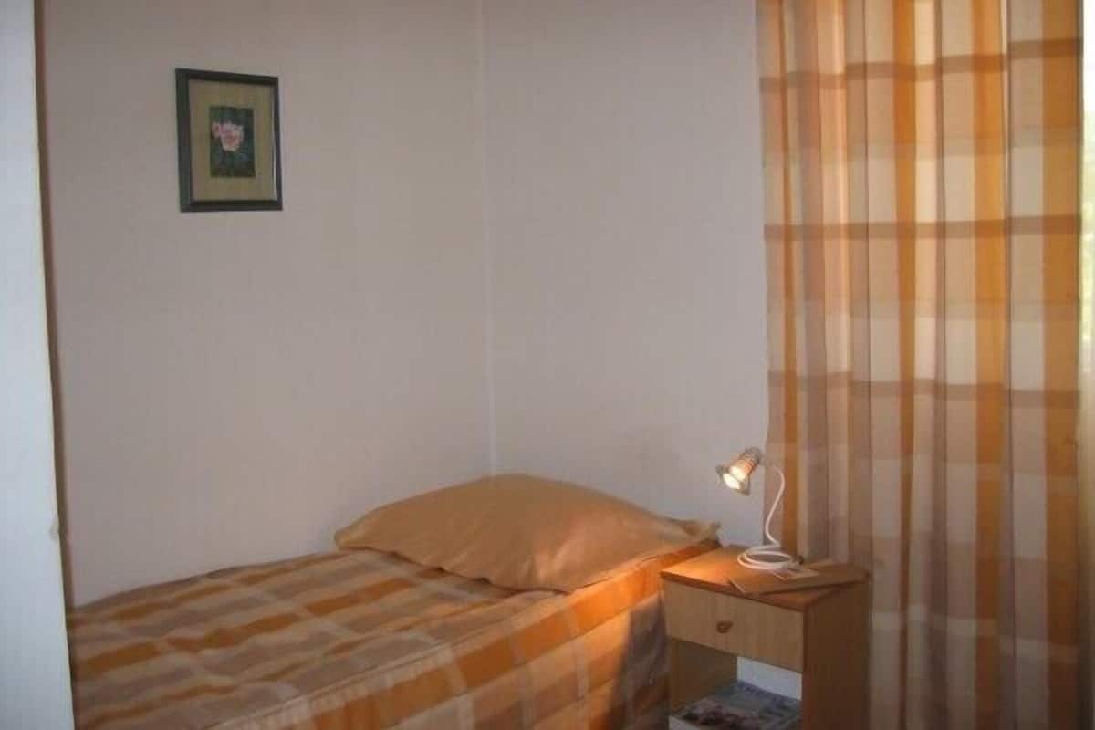 Quarto Standard, 1 cama de solteiro | Escrivaninha, cortinas blackout, Wi-Fi de cortesia