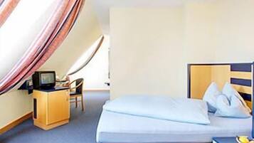 Quarto Individual | Cofre no quarto, secretária, quartos insonorizados, Wi-fi grátis