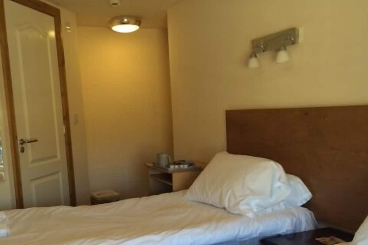 Quarto Twin | Quartos insonorizados, ferro/tábua de engomar, Wi-fi grátis