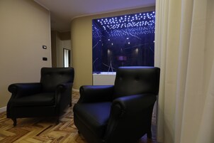 Suite Comfort | Sala de estar | Televisor 