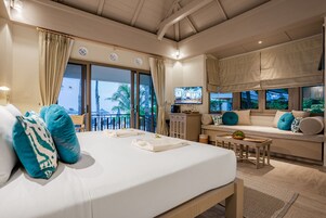 Deluxe Beach Front Bungalow | Cofre no quarto, secretária, quartos insonorizados 