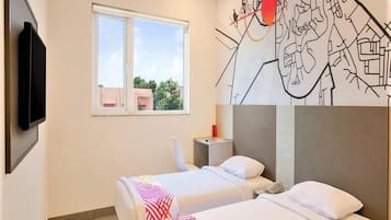 Roupas de cama premium, cofres nos quartos, escrivaninha