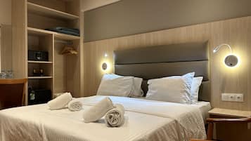 Roupa de alta qualidade, minibar, cofre no quarto
