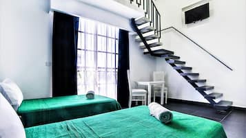Suíte júnior | 1 quarto, escrivaninha, Wi-Fi de cortesia, roupa de cama