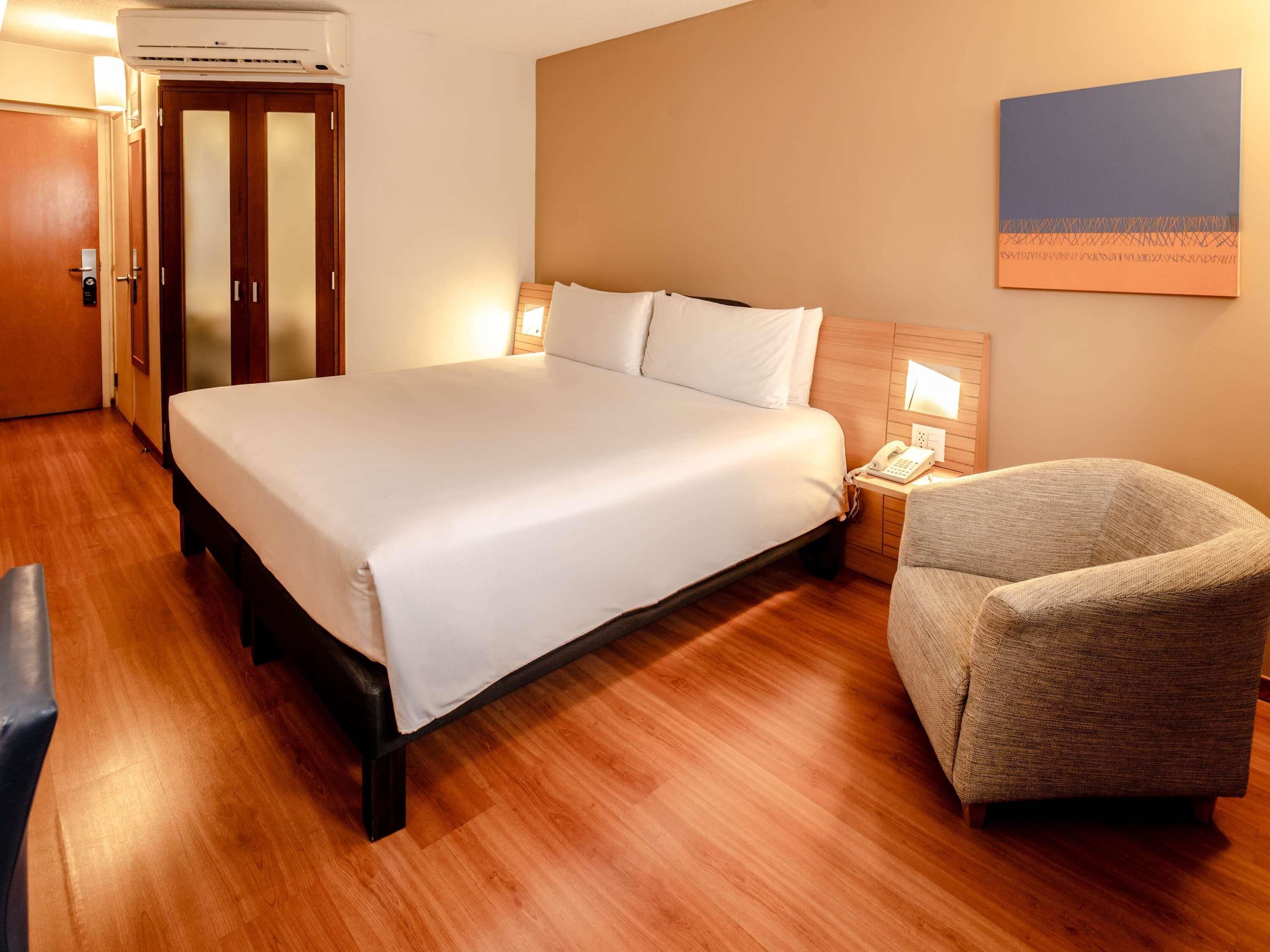 Quarto standard, 1 cama de casal | Frigobar, cofres nos quartos, escrivaninha, cortinas blackout