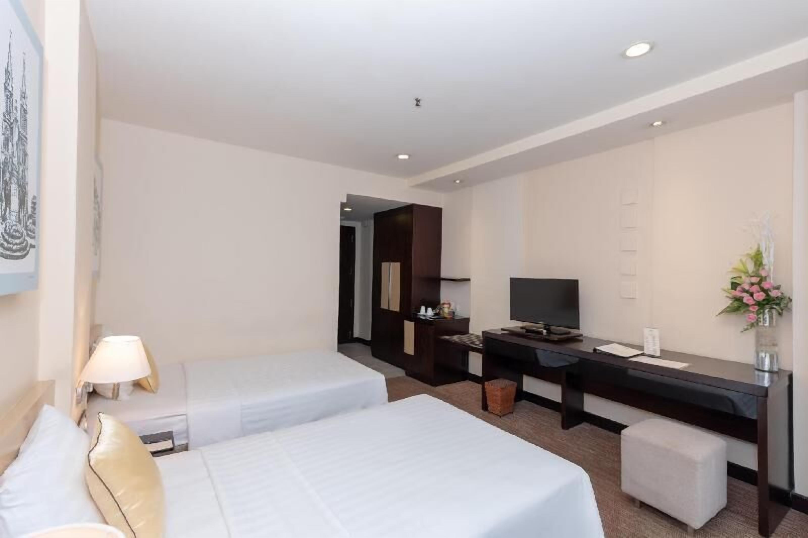 Edredões de penas, minibar, cofre no quarto, Wi-fi grátis 