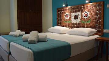 Suite Familiar | Lençóis de algodão egípcio, minibar, cofre no quarto