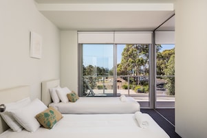 Apartamento standard, 2 quartos, para não fumantes, banheiro compartilhado (Beachside) | 1 quarto, roupas de cama premium, individualmente decorados