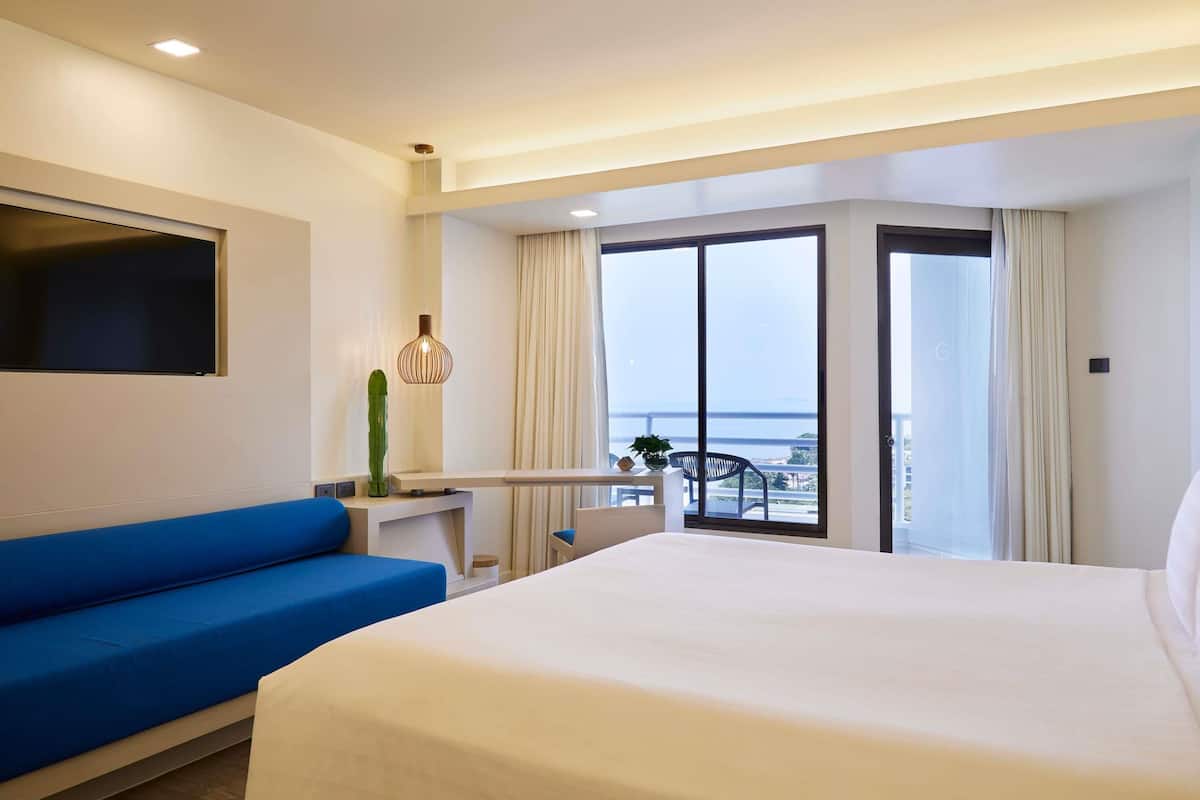 Quarto premium, 1 cama King, vista para o mar | 1 quarto, roupas de cama antialérgicas, edredons de pluma