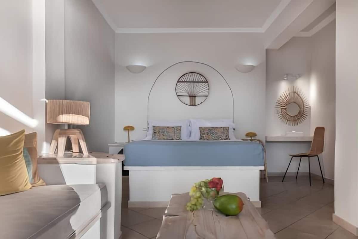 Junior Suite Sunset View | Lençóis de algodão egípcio, minibar, cofre no quarto 