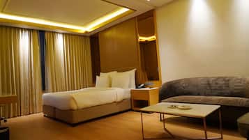 Quarto club | 1 quarto, roupas de cama premium, frigobar, cofres nos quartos