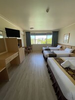 Quarto família | Área de estar | TV 58 cm com canais digitais