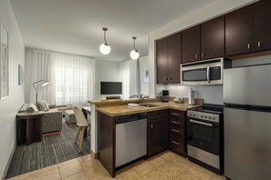 Suite, 2 quartos | Cortinas/cortinados opacos, ferro/tábua de engomar, Wi-fi grátis 