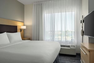 Suite, 2 quartos | Cortinas/cortinados opacos, ferro/tábua de engomar, Wi-fi grátis 