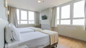 Premium Twin | 1 quarto, escrivaninha, Wi-Fi de cortesia, roupa de cama