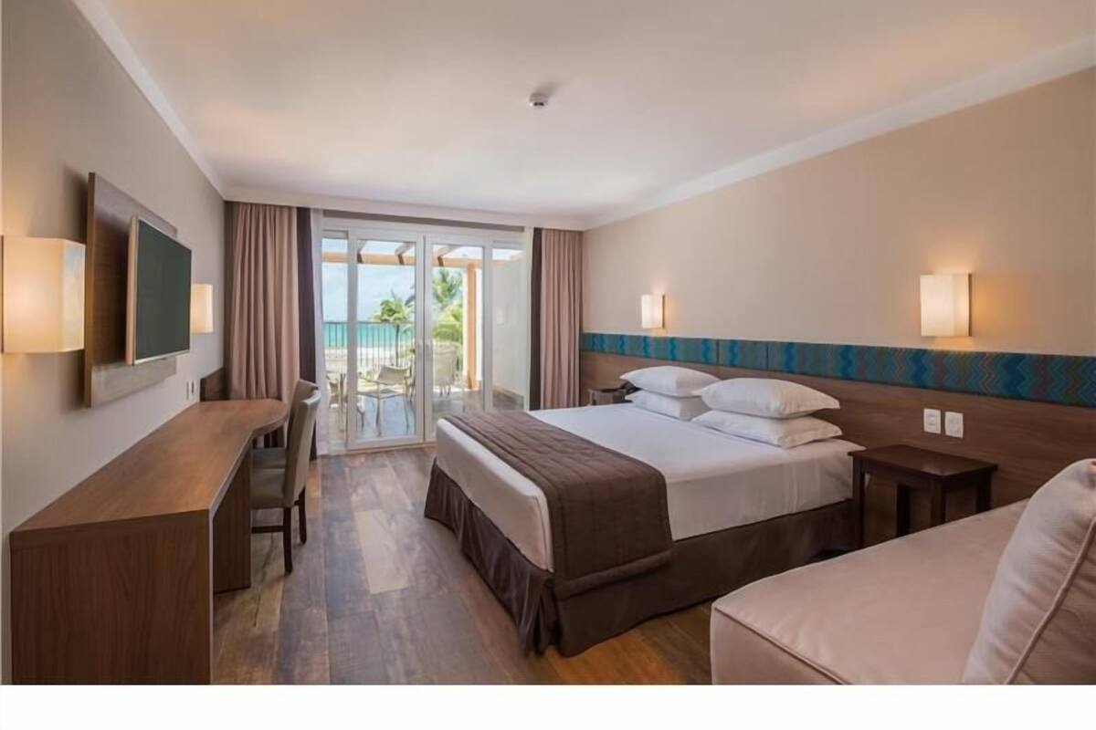 Quarto Triplo Superior, pátio, vista para o mar | Minibar, cofre no quarto, secretária 
