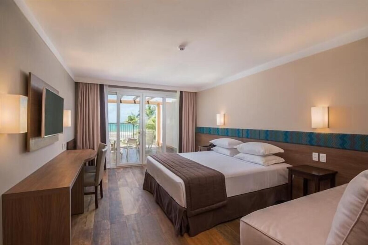 Quarto Triplo Superior, pátio, vista para o mar | Minibar, cofre no quarto, secretária 