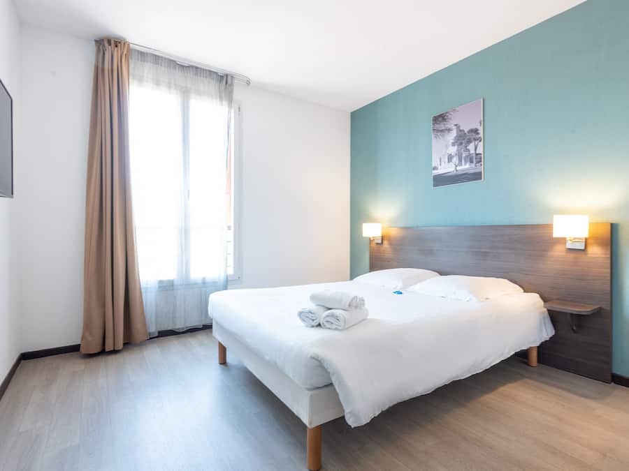 Secretária, quartos insonorizados, Wi-fi grátis