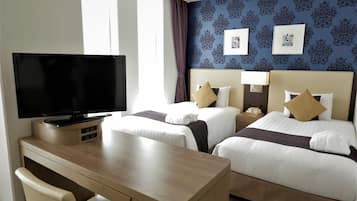 Quarto Deluxe, 2 camas individuais, não fumadores | Cofre no quarto, secretária, cortinas/cortinados opacos