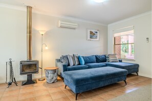 Apartamento | Área de estar | TV de tela plana