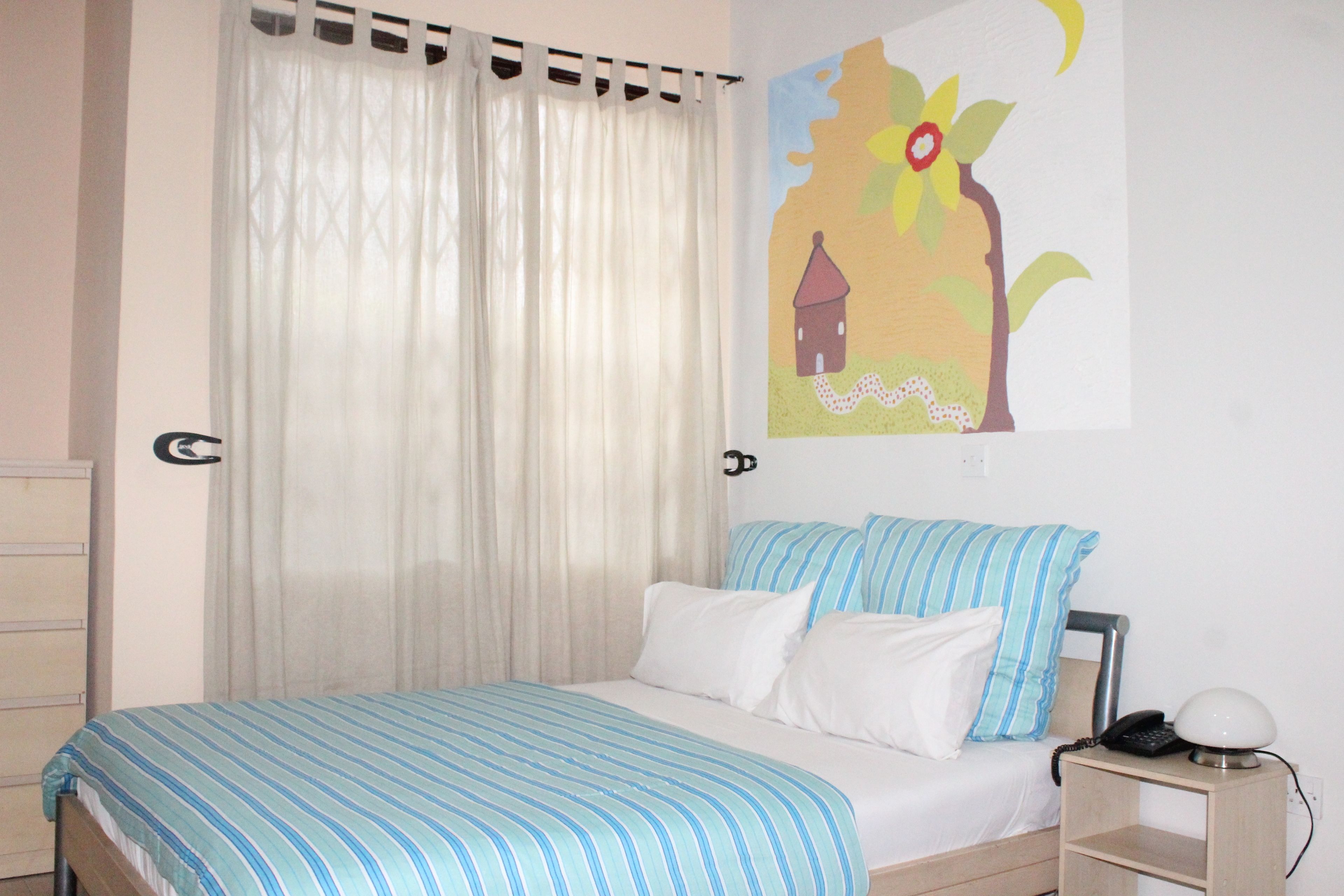 Apartamento grand, 2 quartos | Edredons de pluma, cofres nos quartos, individualmente mobiliados