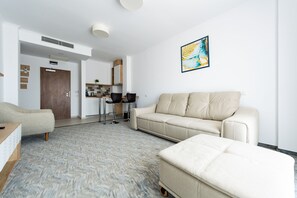 Apartamento standard | Área de estar | Smart TV