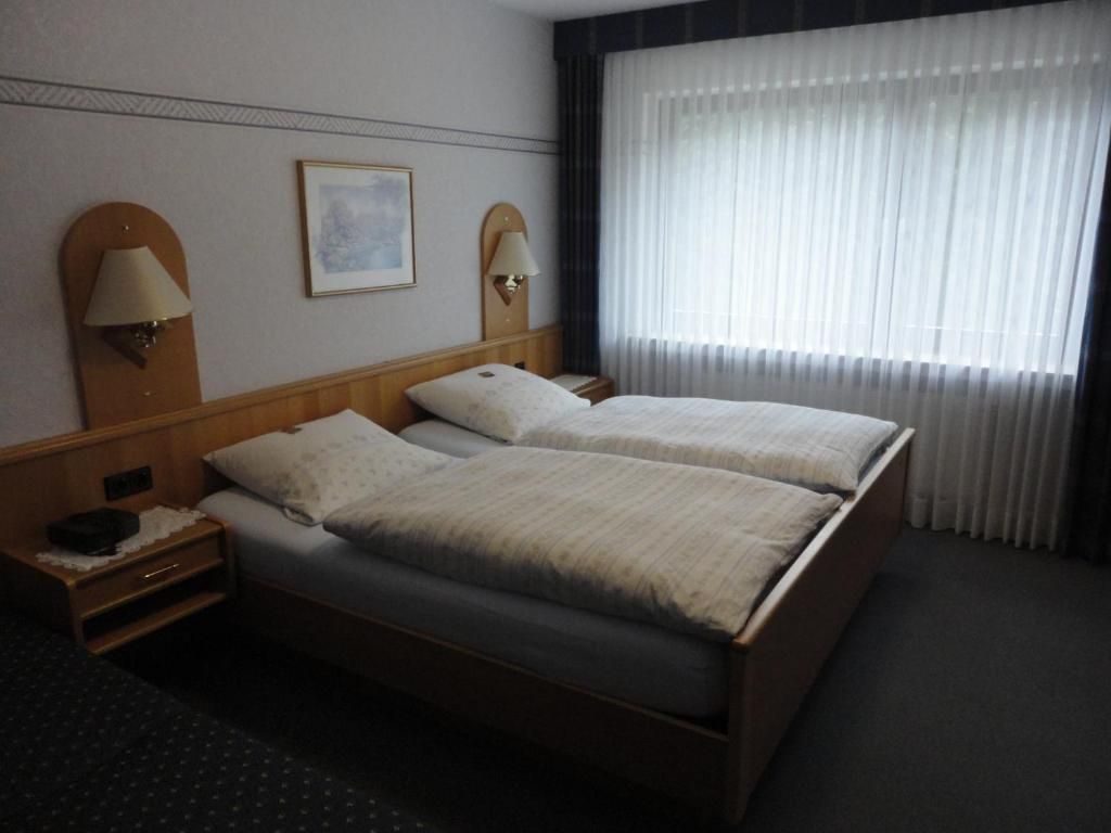 Quartos à prova de som, Wi-Fi de cortesia, roupa de cama